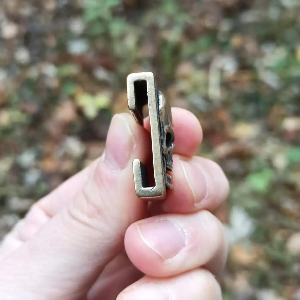 Human skull molle clip | metal edc gear patch – WikkedKnot jewelry